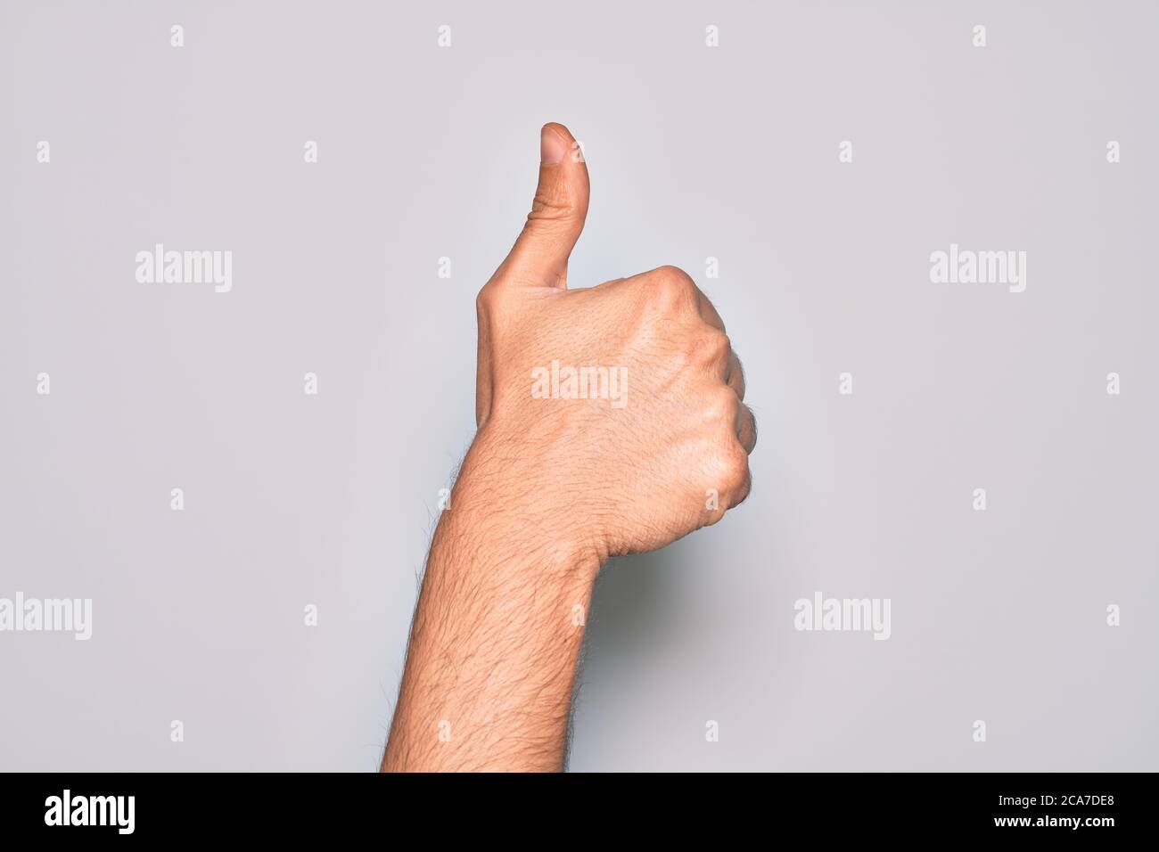 Hand of caucasian young man showing fingers over isolated white ...