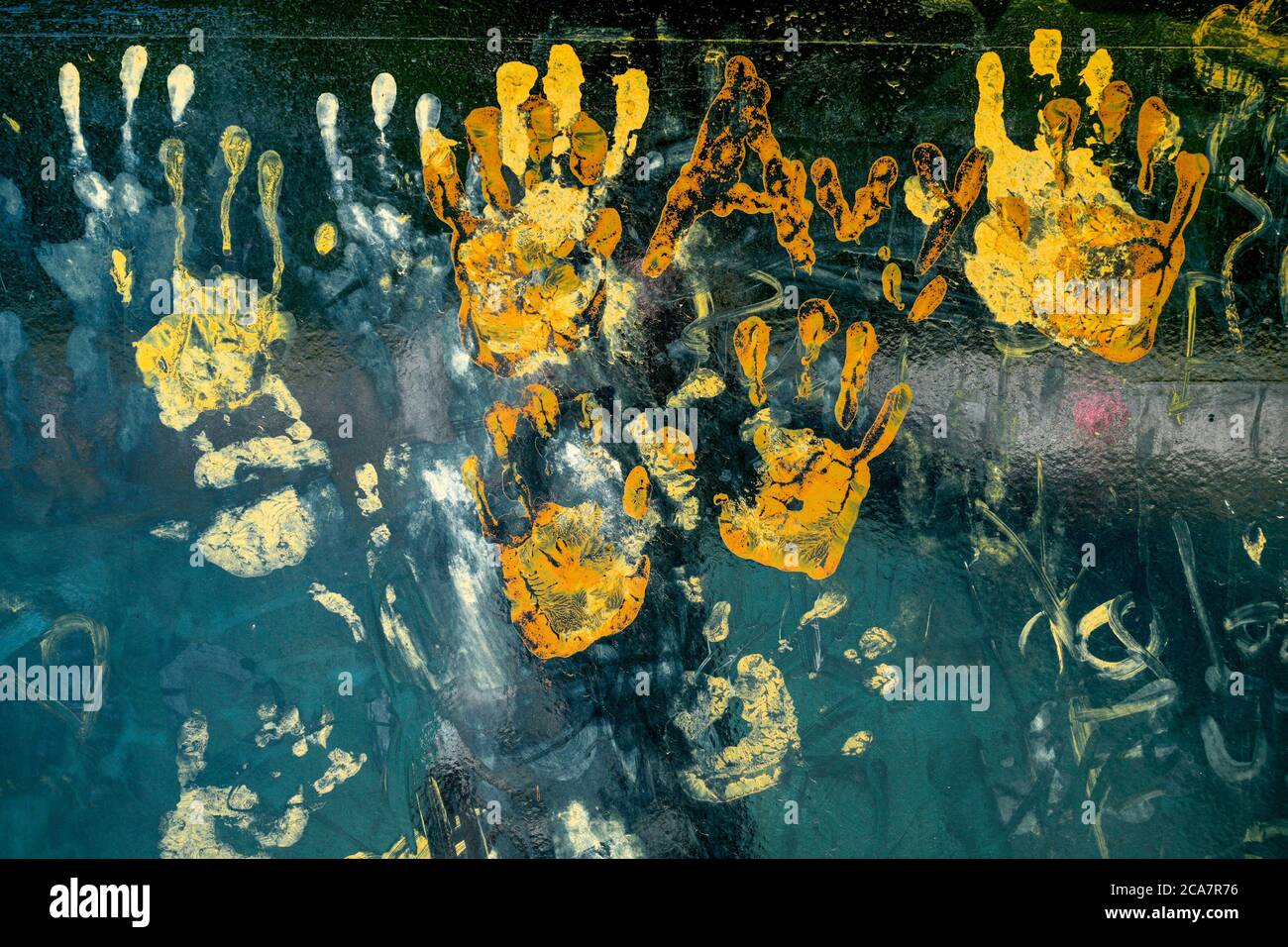 Mud hand prints hi-res stock photography and images - Alamy