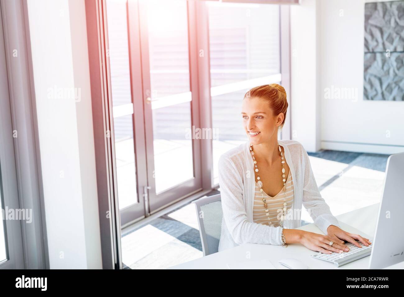 Elegant office worker Stock Photo - Alamy