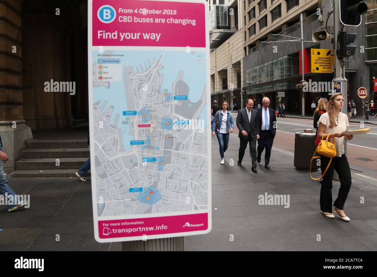A sign on George Street, Sydney provides information about bus route ...