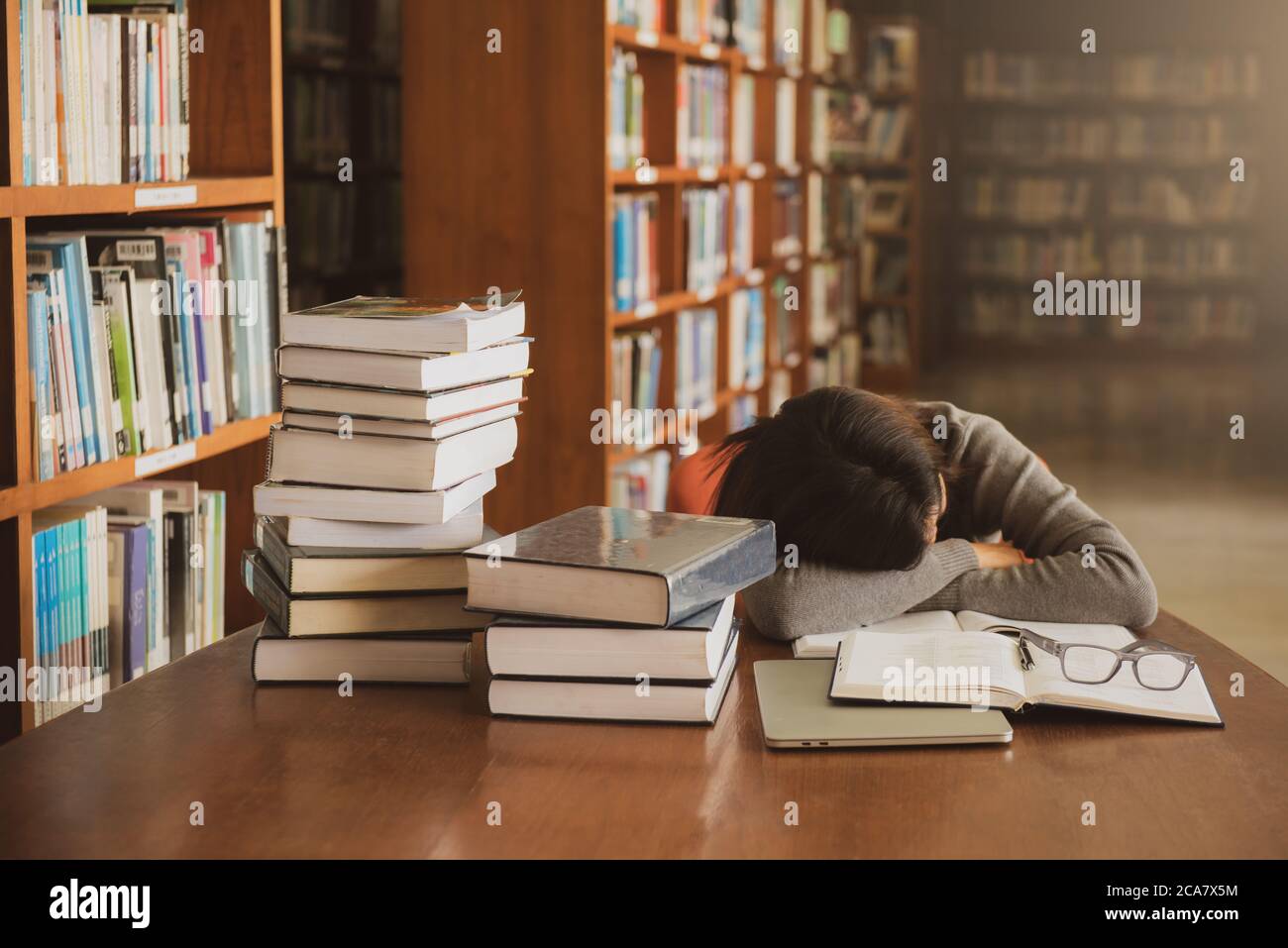Student sleeping study table hi-res stock photography and images - Alamy