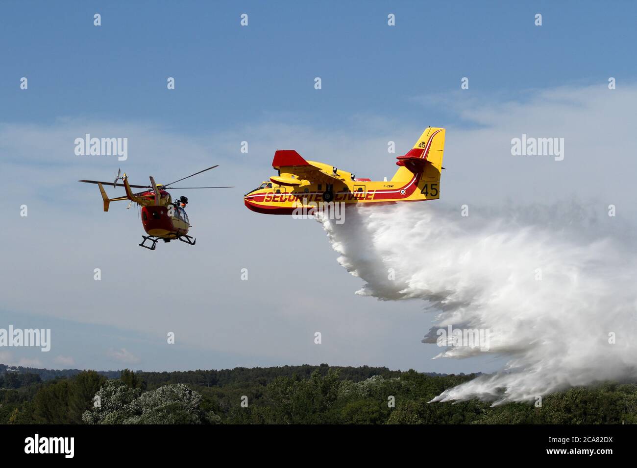 Canadair CL-415 firefighting aircraft during training seen next to an ...