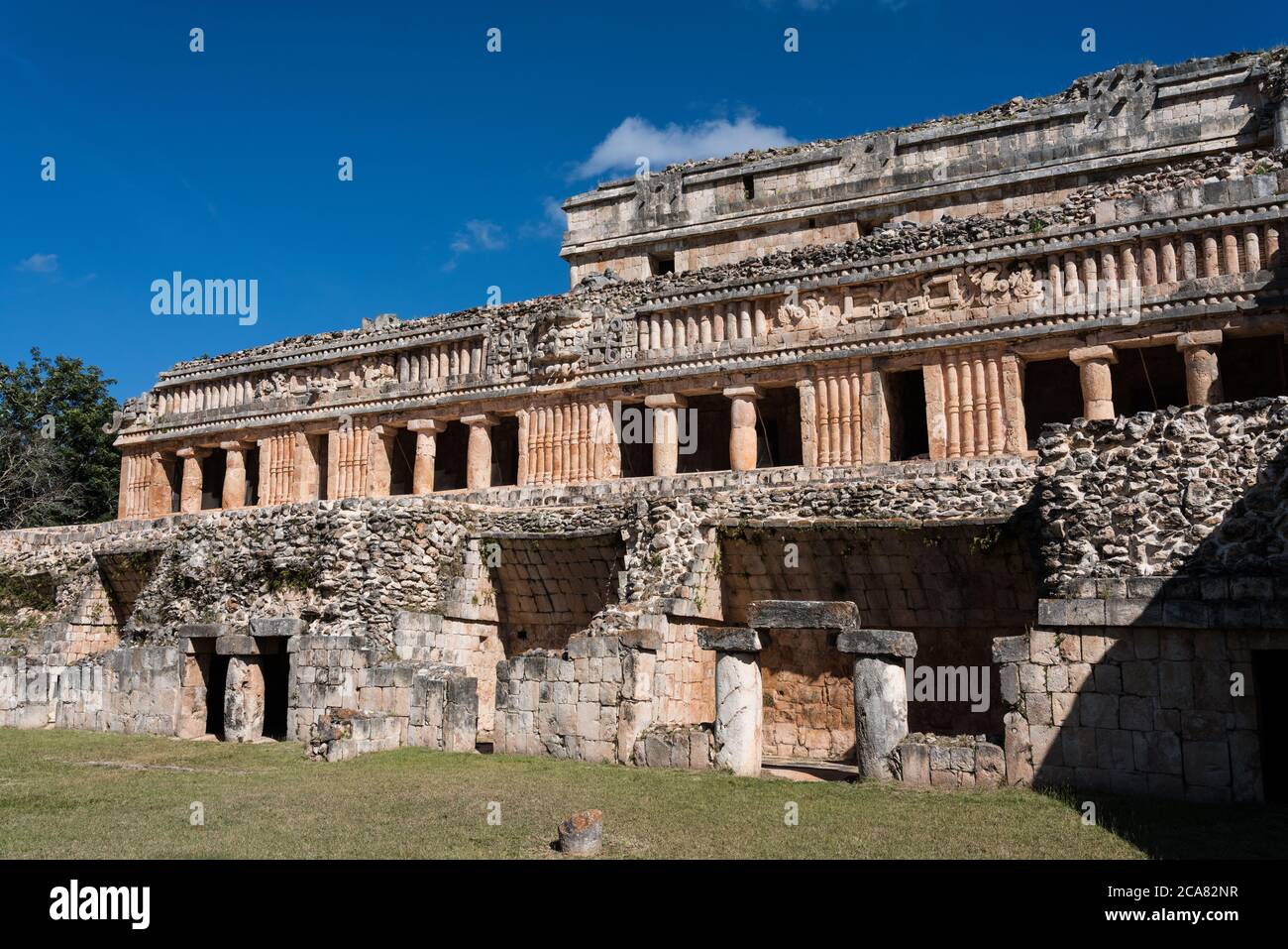 The Grand Palace in the ruins of the Mayan city of Sayil are part of ...