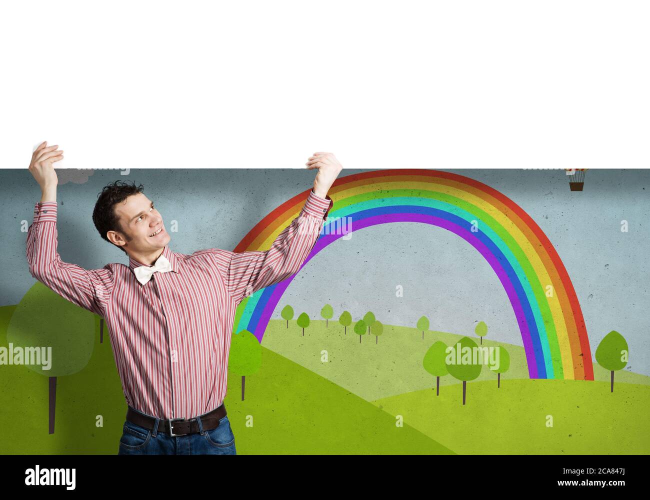 Cheerful man with banner Stock Photo - Alamy