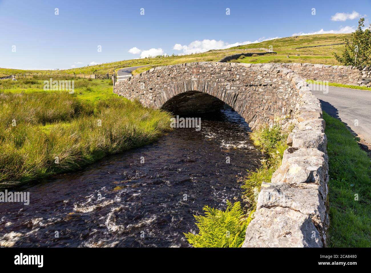 Old stone bridge at Eskdale in the Lake District, Cumbria, England ...