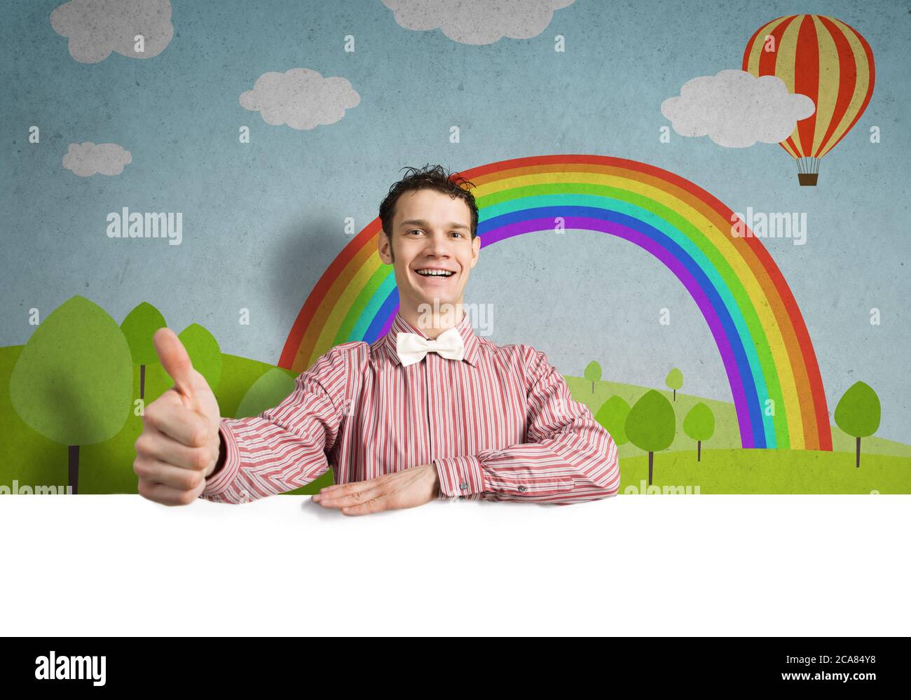 Cheerful man with banner Stock Photo - Alamy