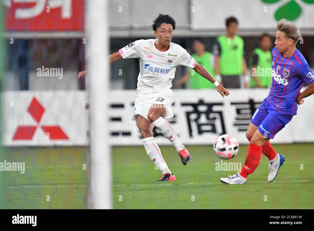 Sagan Tosu's Teruki Hara (L) and FC Tokyo's Shuto Abe during the 2020 ...