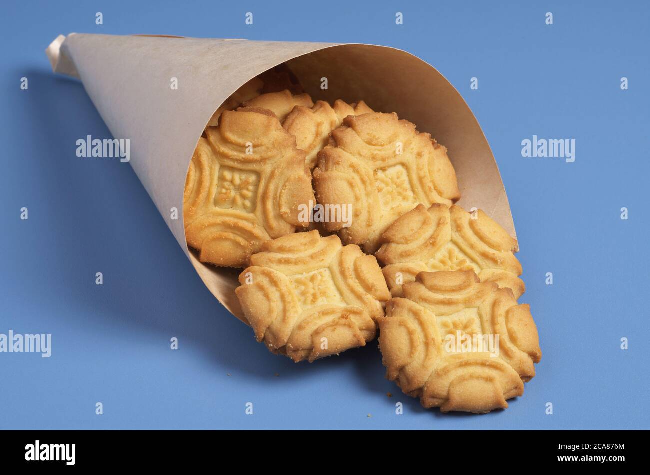 Biscuit shortbread cookies in paper bag on blue table Stock Photo - Alamy