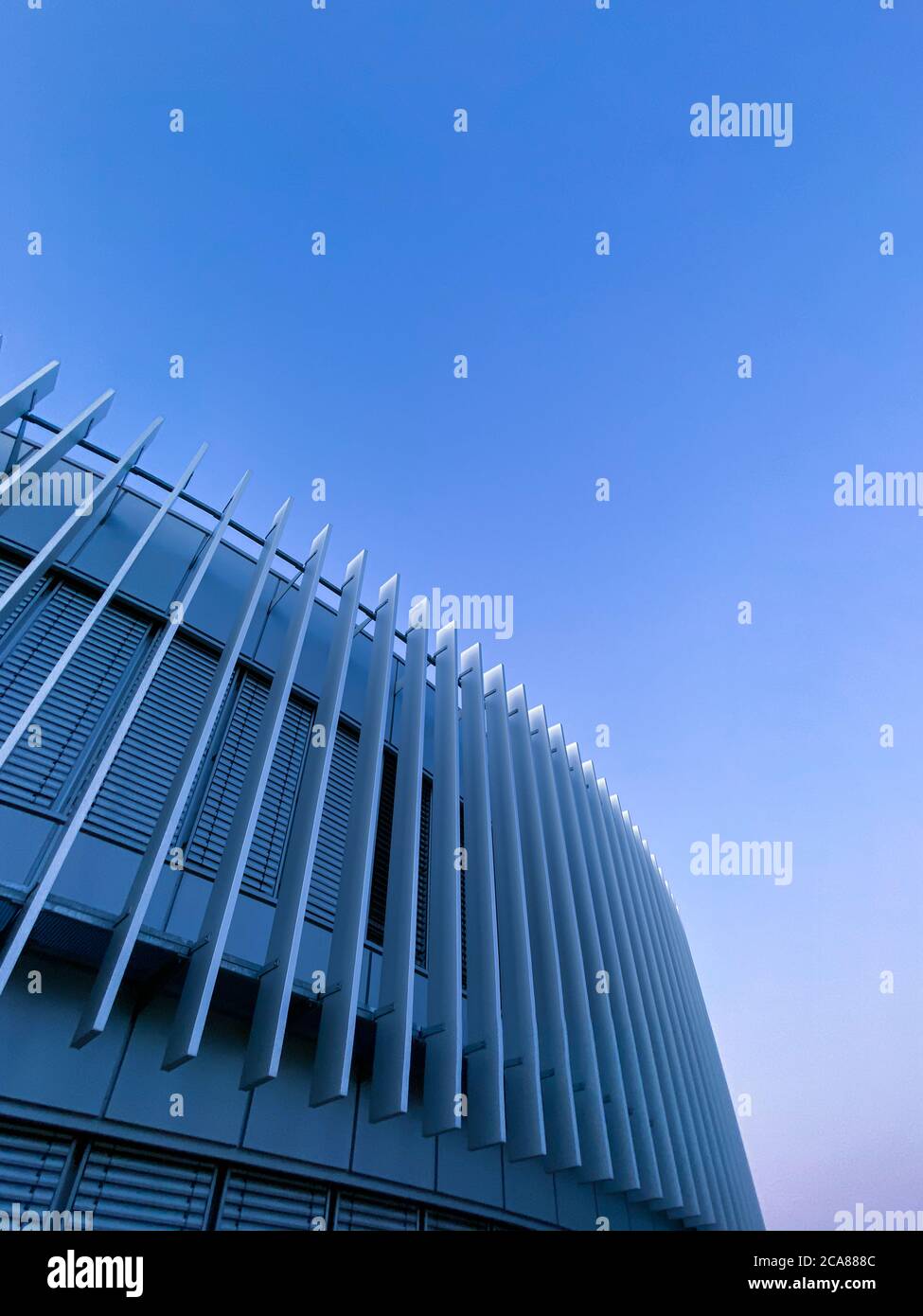 The tall building of French hospital with clear blue sky in the ...
