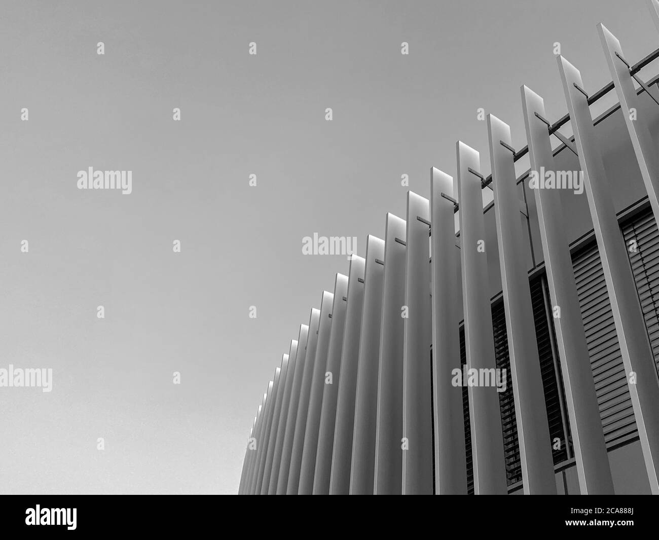 The tall building of French hospital with clear sky in the background ...