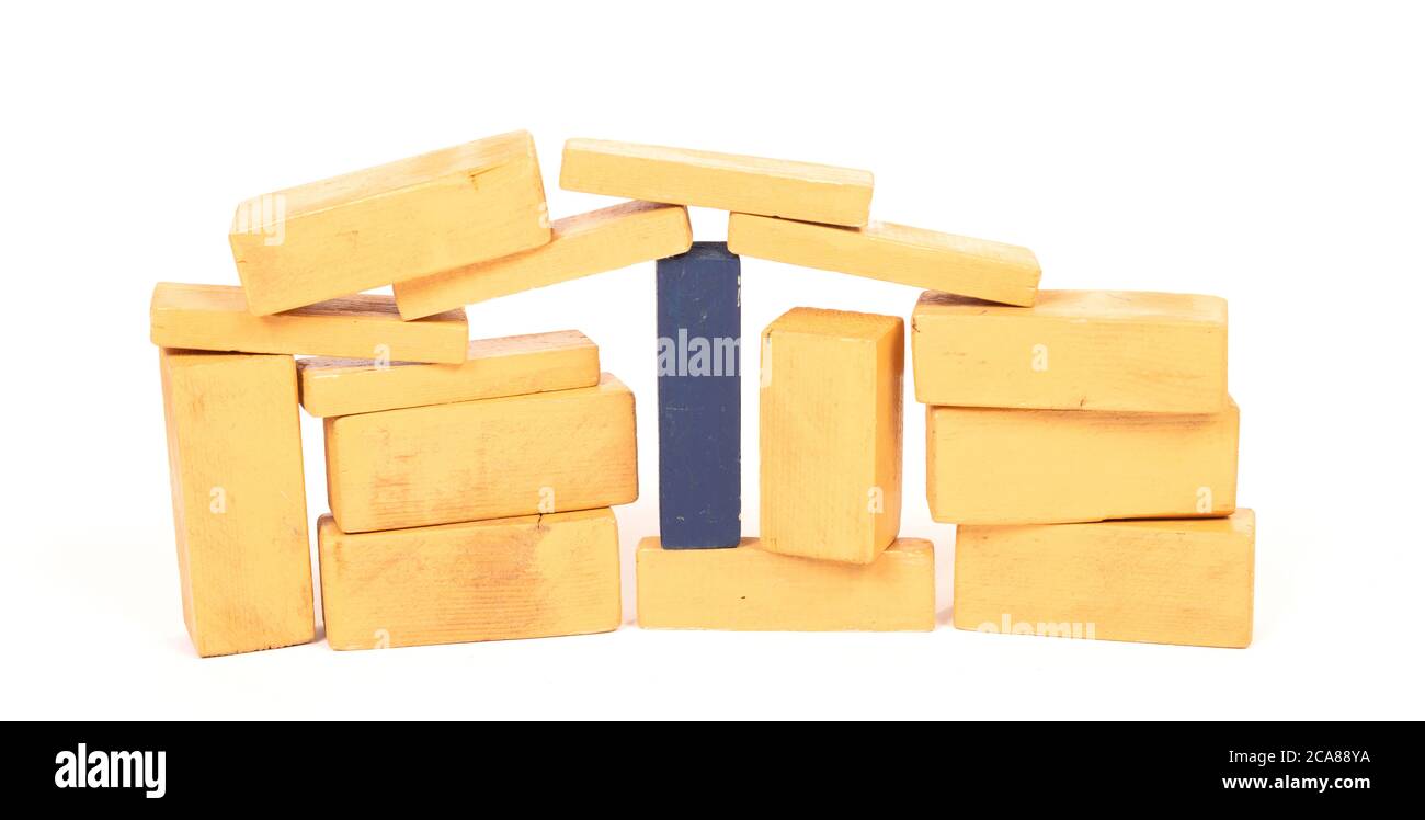 Vintage orange building blocks isolated on white background, one blue ...
