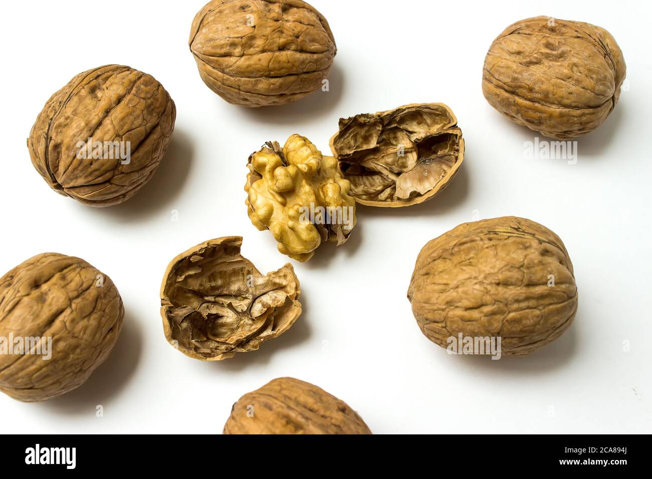 Crushed Walnuts On White Background Stock Photo - Alamy