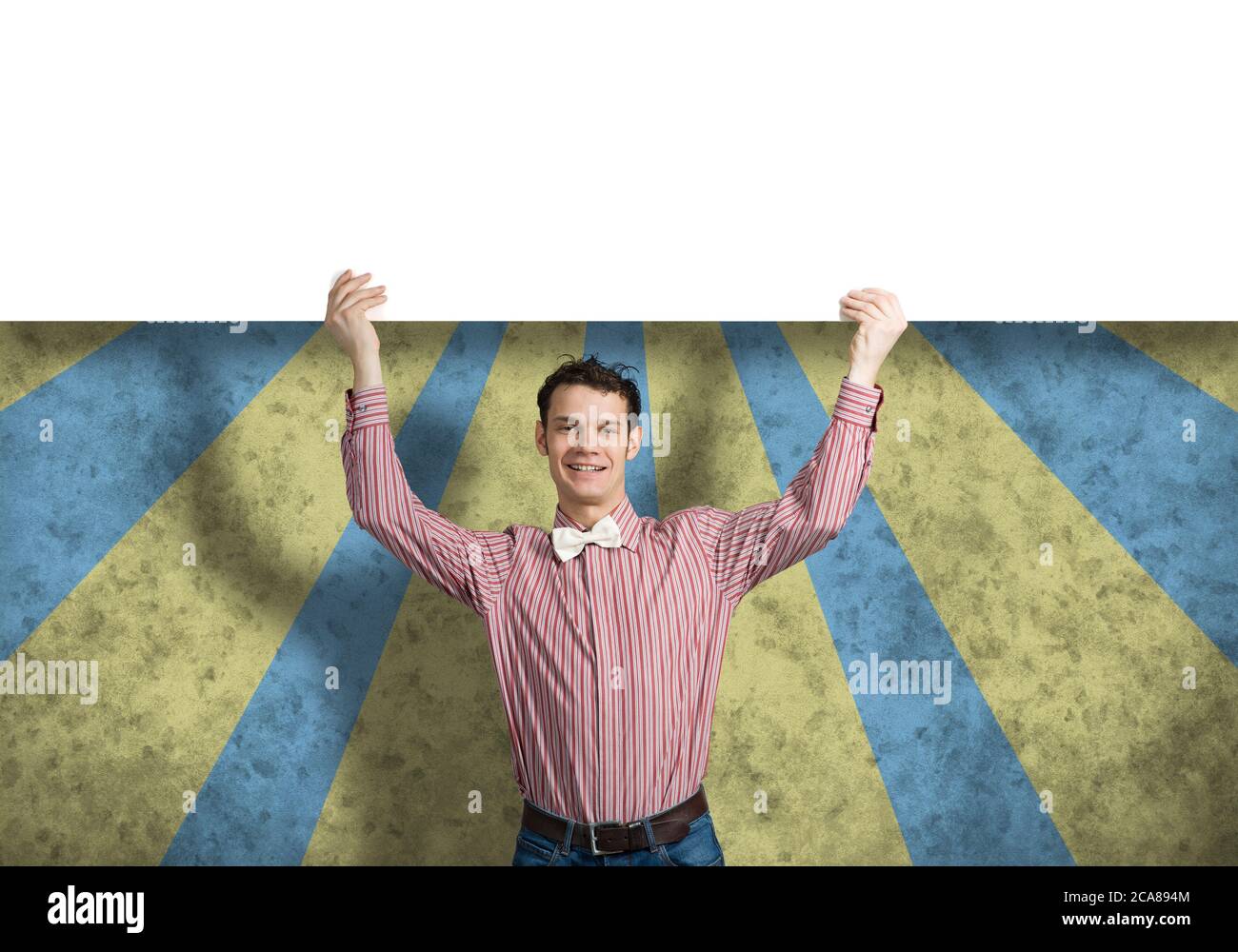 Cheerful man with banner Stock Photo - Alamy