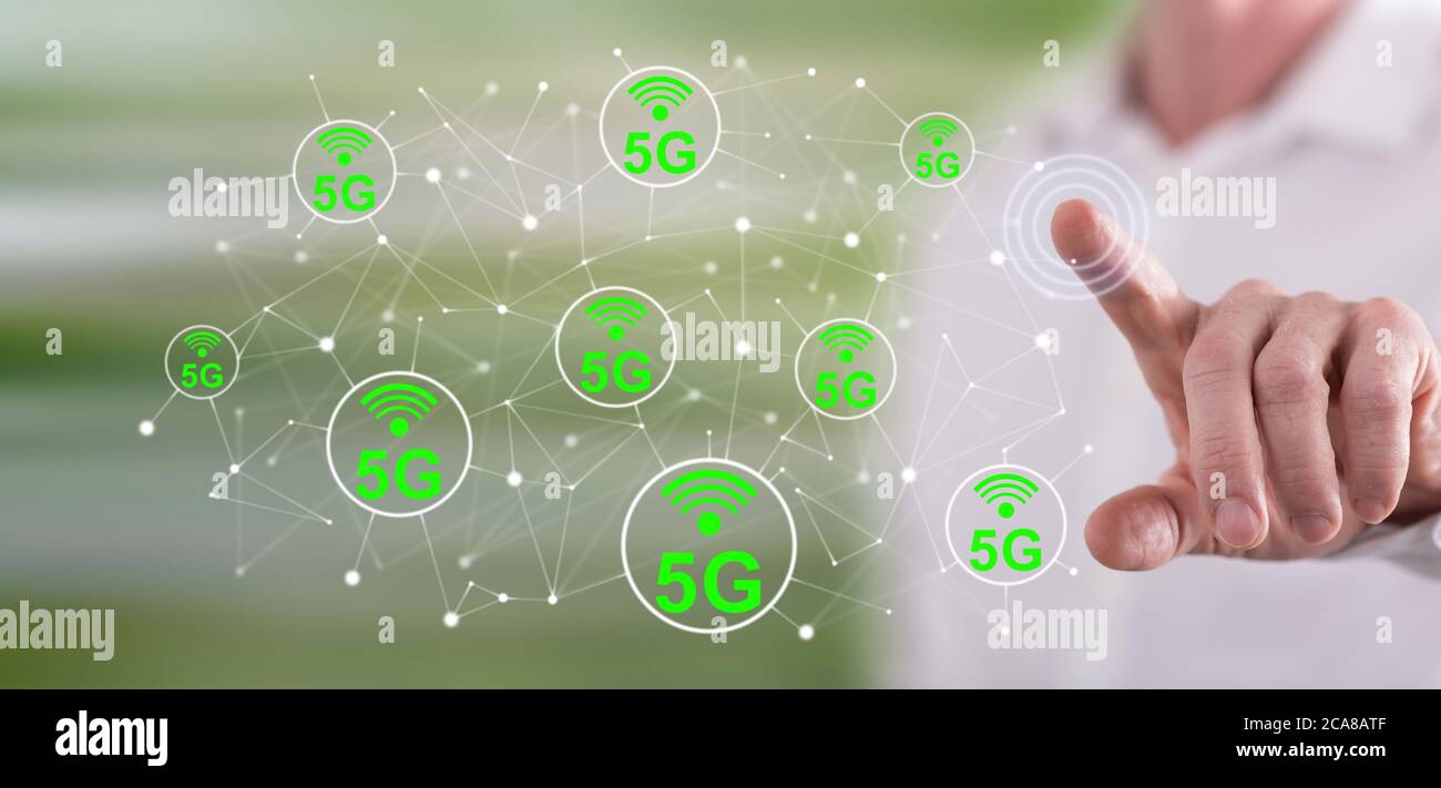 Man touching a 5g concept on a touch screen with his finger Stock Photo ...
