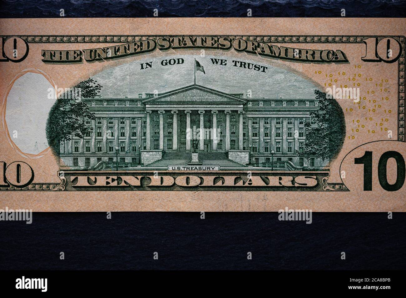 Selective focus on detail of 10 dollars banknote. Close up macro detail ...