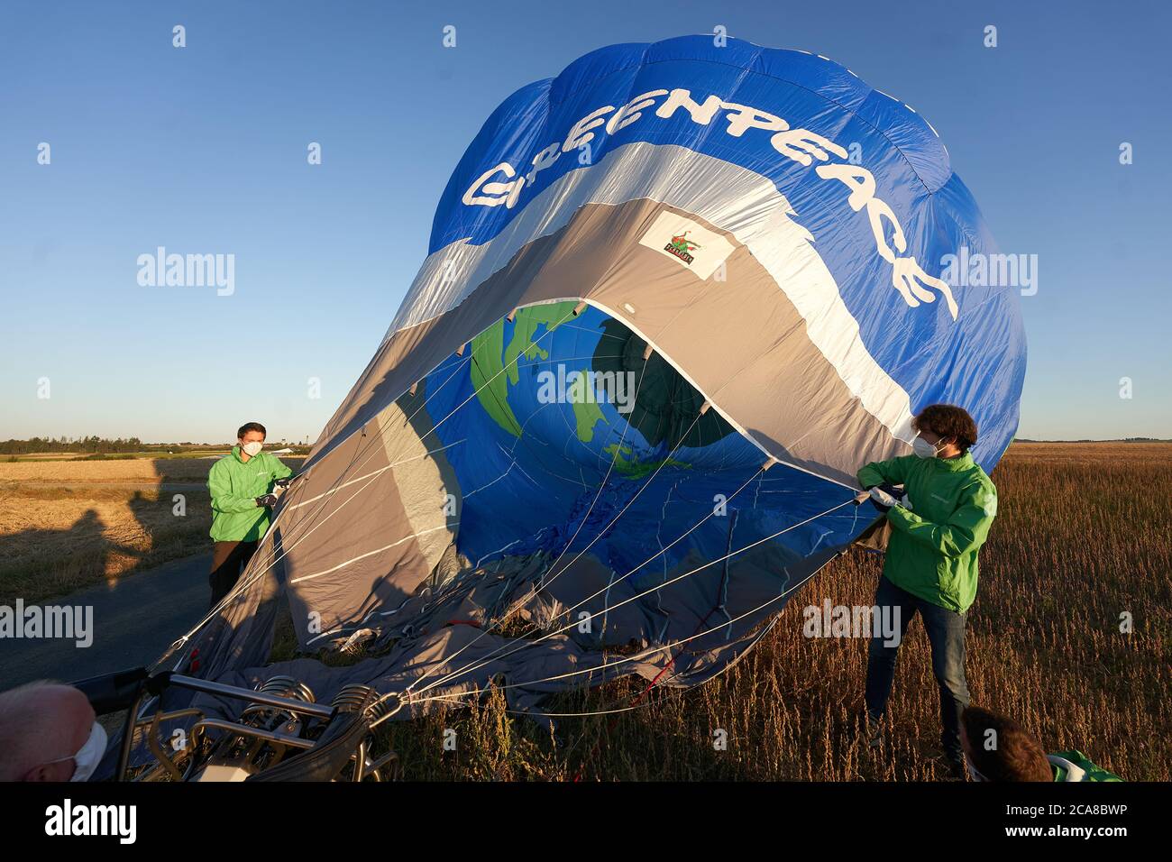 Buchel, Germany. 05th Aug, 2020. Greenpeace activists protest with a ...