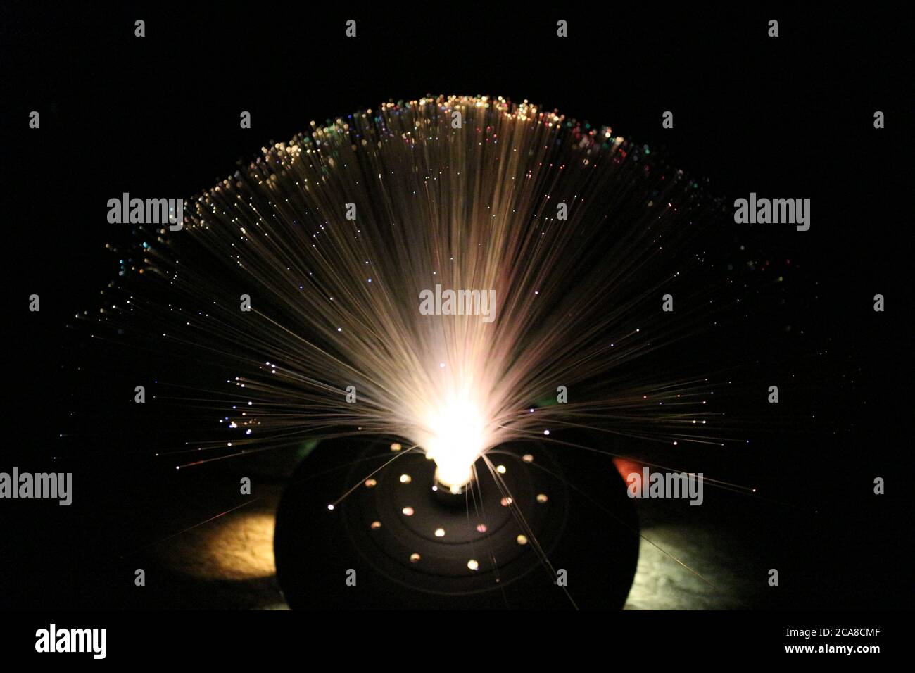 The fiber optic lamp produces suggestive lighting effects Stock Photo ...