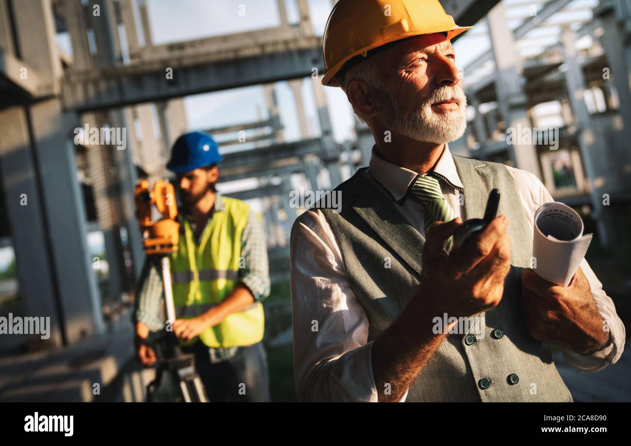 Picture of construction engineer working on building site Stock Photo ...