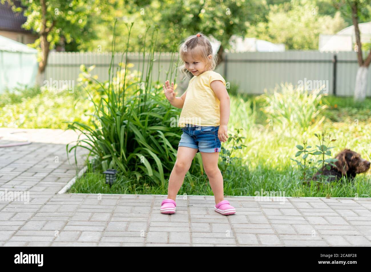 Little girl dances in the country. children's dances in nature Stock ...