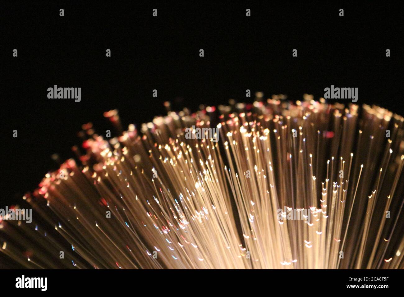 The fiber optic lamp produces suggestive lighting effects Stock Photo ...