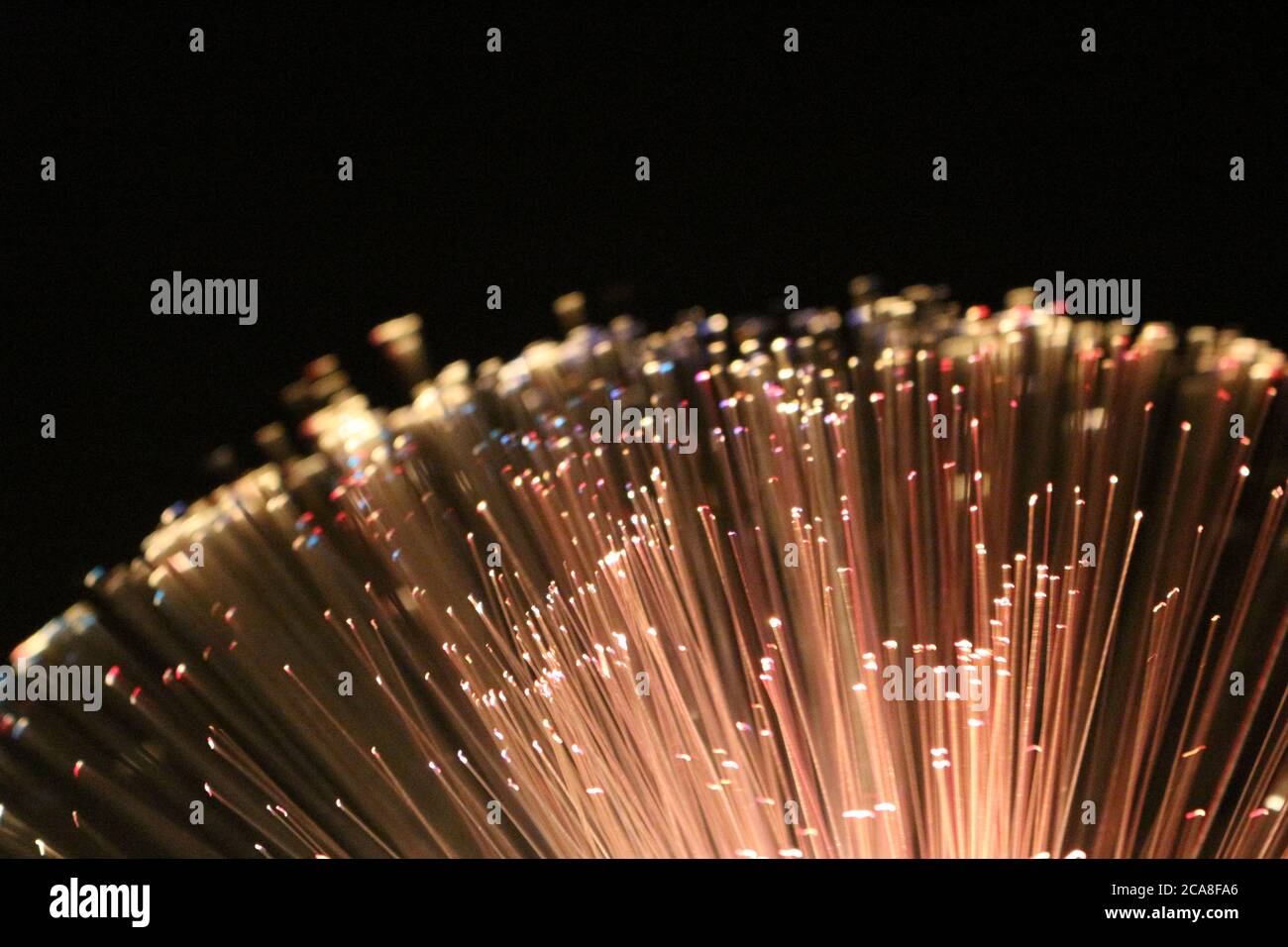The fiber optic lamp produces suggestive lighting effects Stock Photo ...