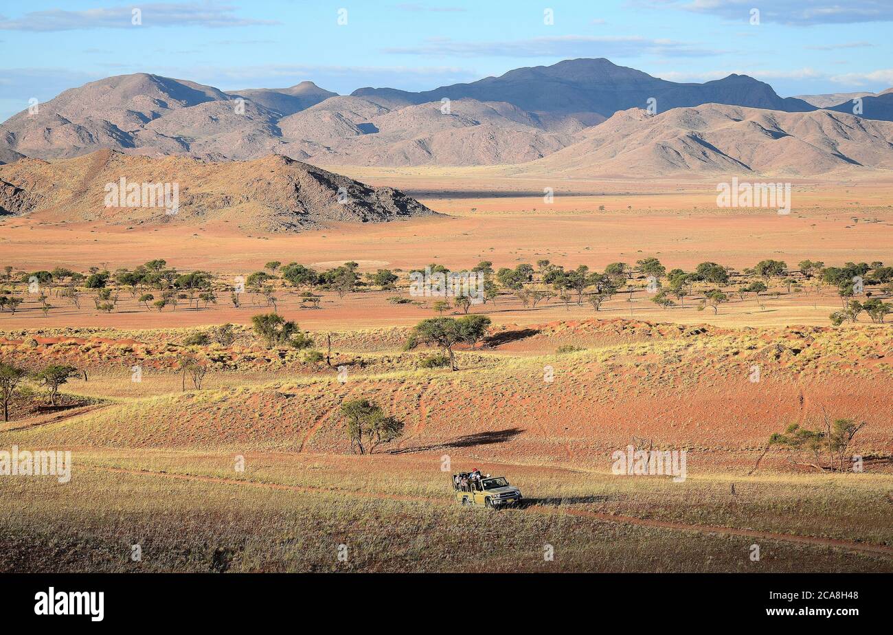 SAFARI IN NAMIBIA. BEAUTIFUL LANDSCAPES WITH SAND AND MOUNTAINS Stock ...