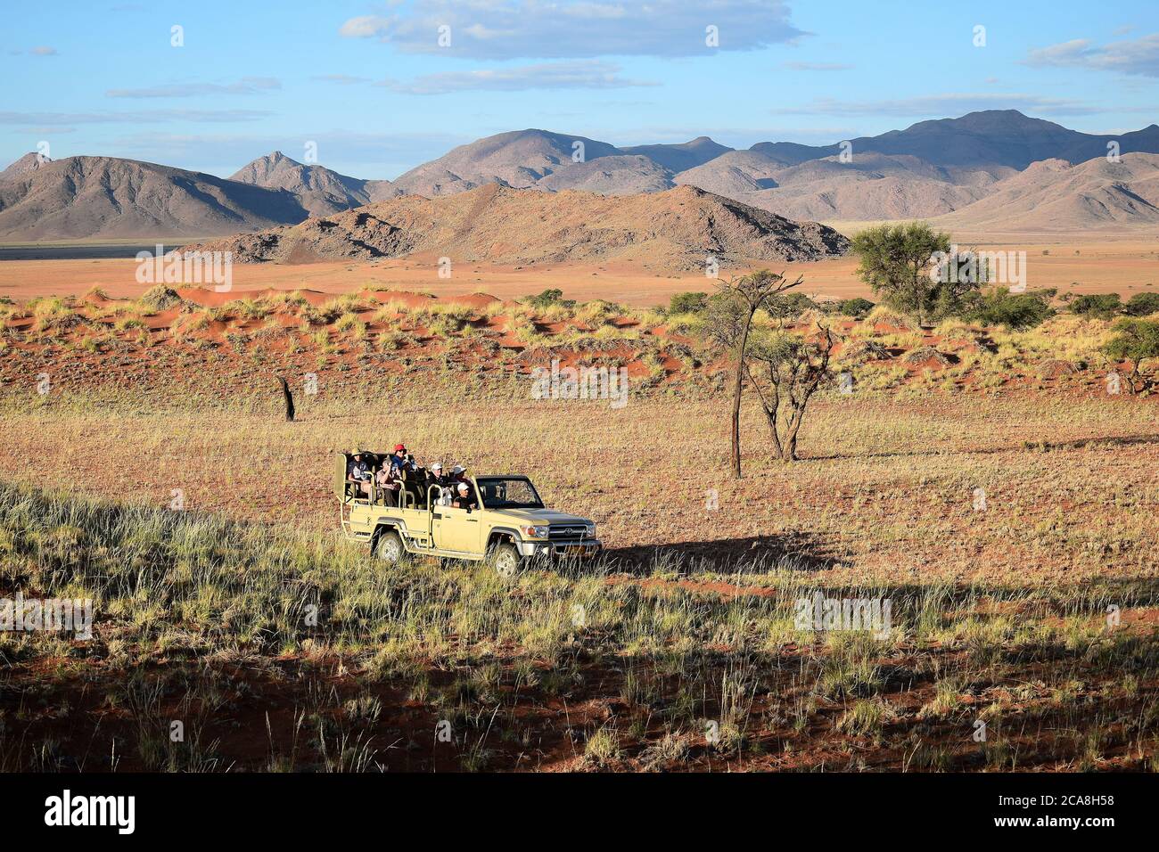 SAFARI IN NAMIBIA. BEAUTIFUL LANDSCAPES WITH SAND AND MOUNTAINS Stock ...