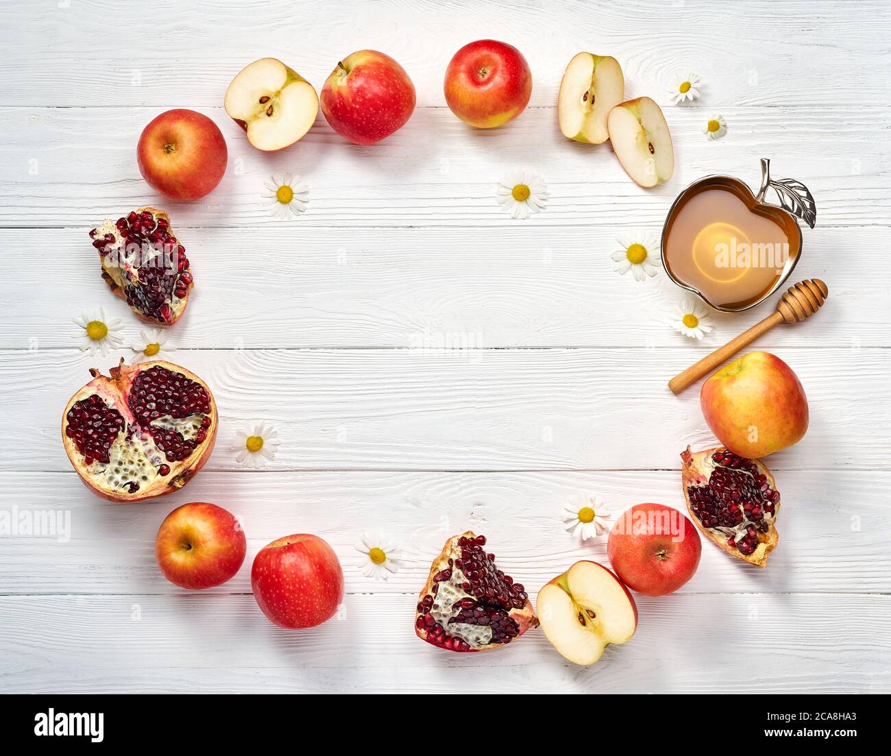 Rosh hashanah (jewish New Year holiday) concept. Traditional symbols. Apples, honey and ...