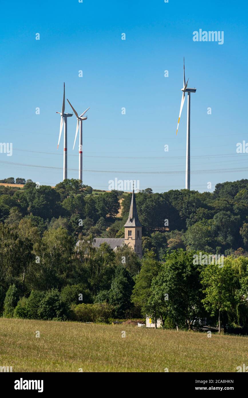 Wind farm, wind turbines, on the heights above the village of Meckel ...