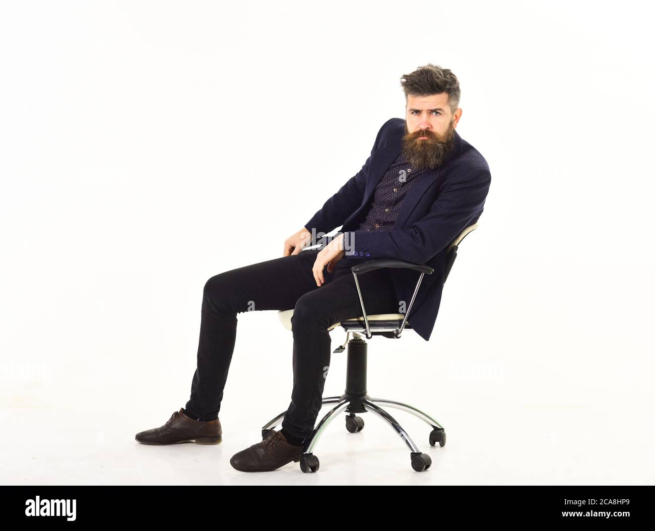 Sad emotions concept. Man sits in office chair with miserable sad face ...
