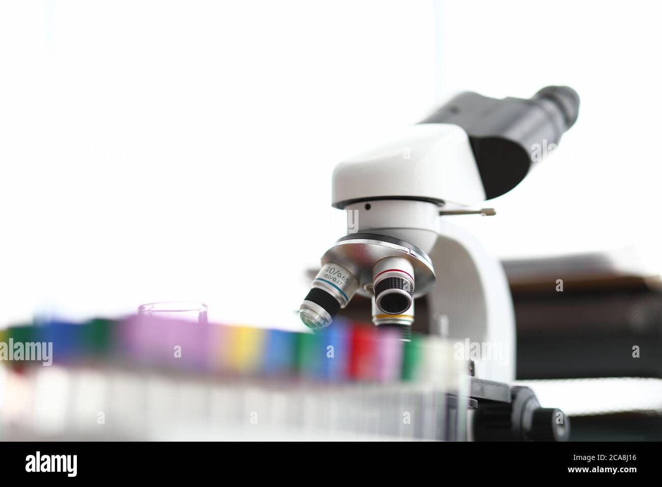 Testing in the laboratory under the microscope Stock Photo - Alamy