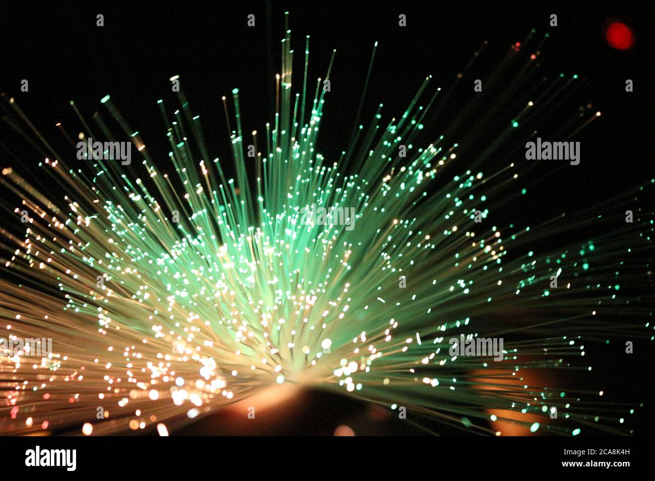 The fiber optic lamp produces suggestive lighting effects Stock Photo ...