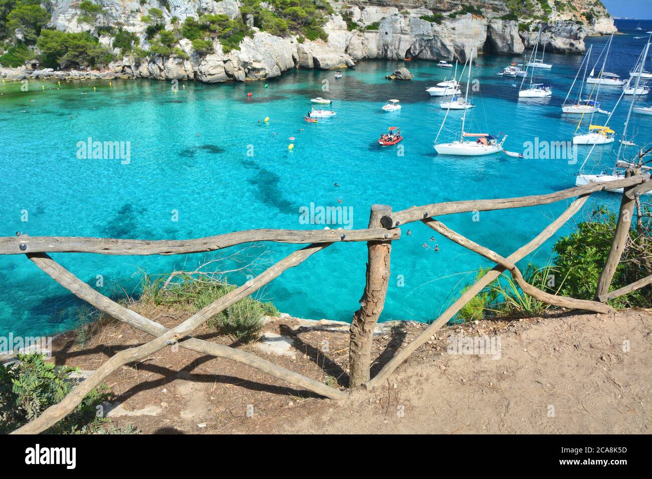 Turquoise water in bay Cala Macarella on Menorca island in Spain ...