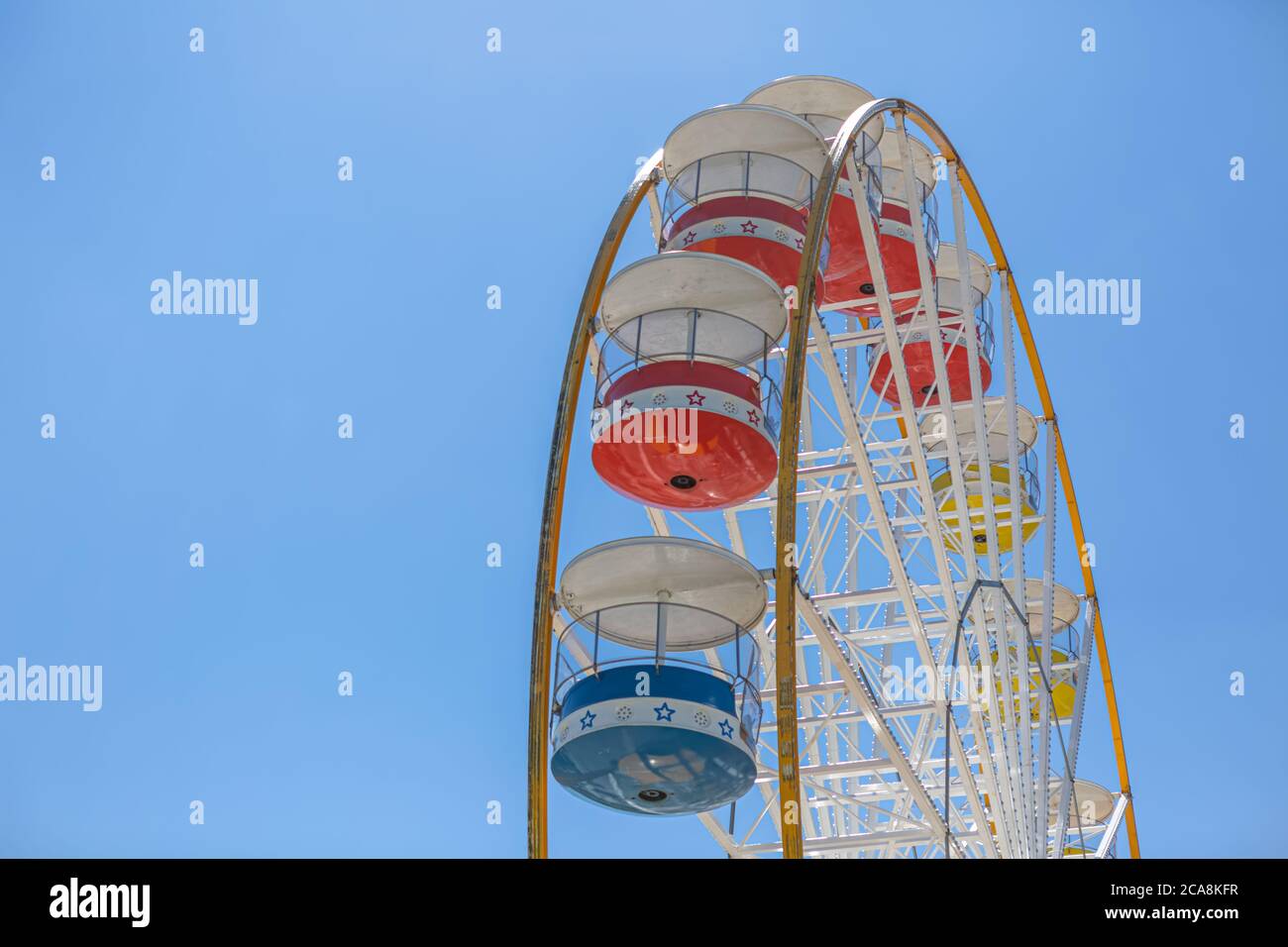 Giant ferris wheel with chairs, metallic structure, recreational ...