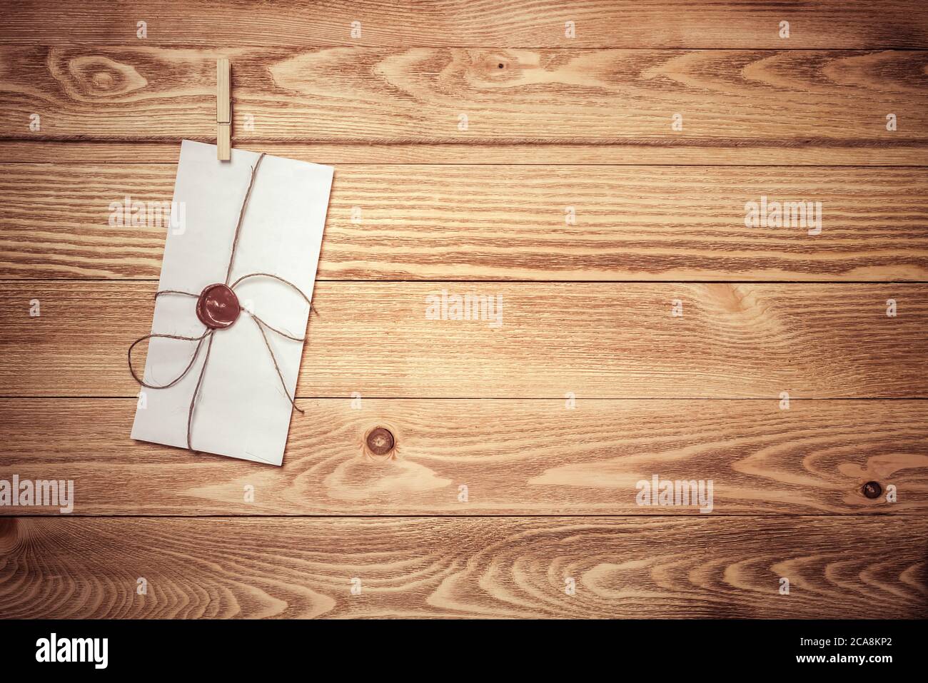 Mail envelope on rope Stock Photo - Alamy