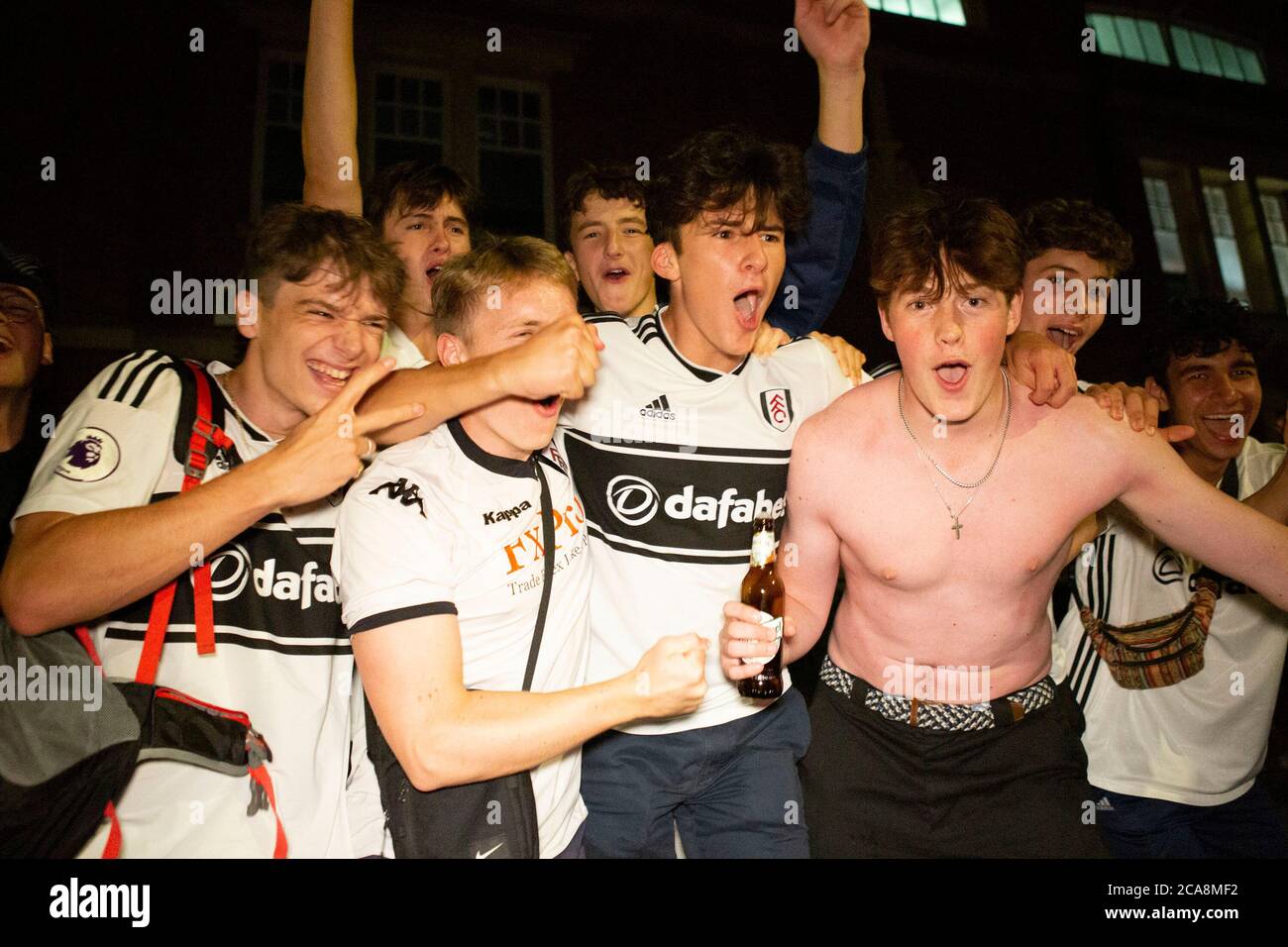 Fulham F.C. fans celebrate their team beating local rivals Brentford F ...