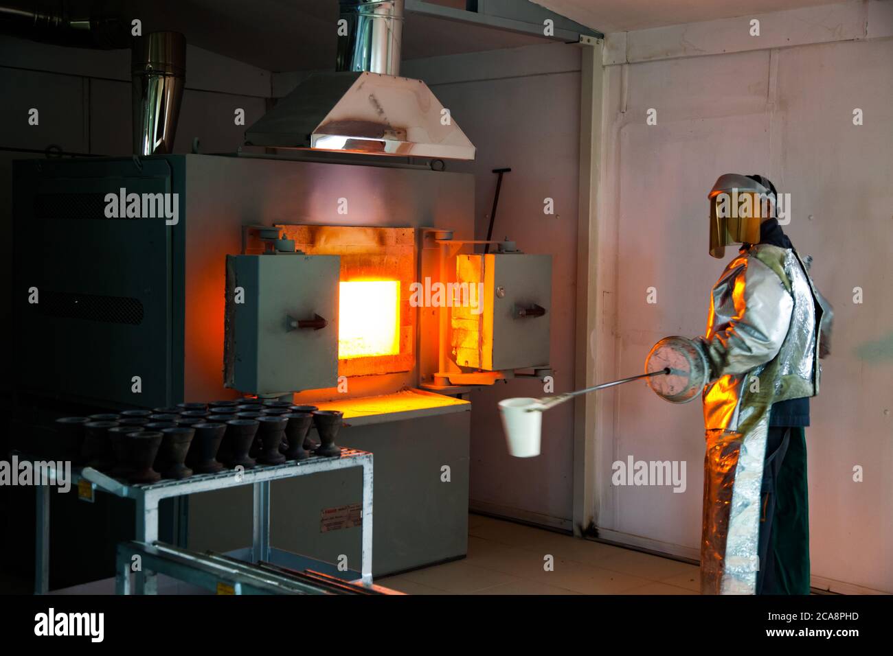Akbabkay/Kazakhstan - April 23 2012: Melting a gold for testing ...