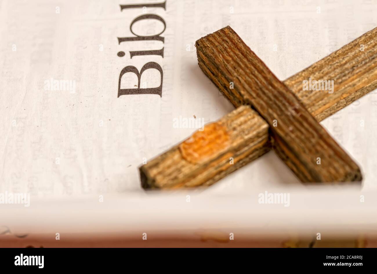 Holly Bible Cross Stock Photo - Alamy