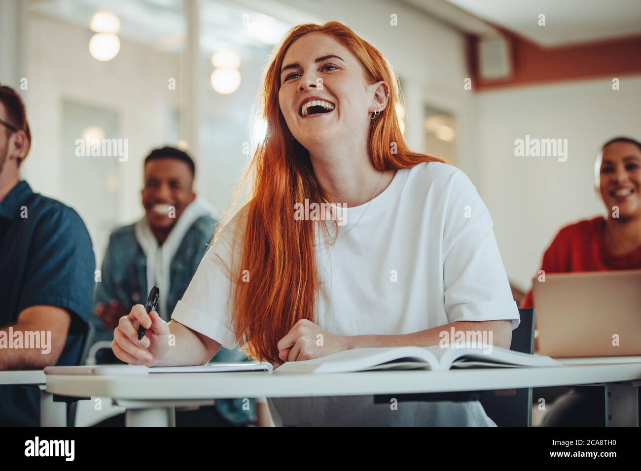 Girls laughing classroom hi-res stock photography and images - Alamy