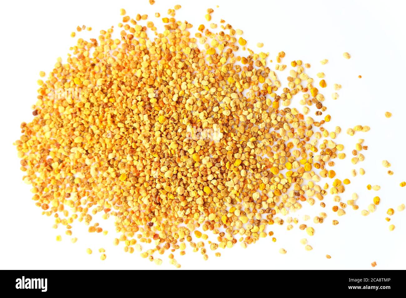 Bee pollen grains on white background Stock Photo - Alamy