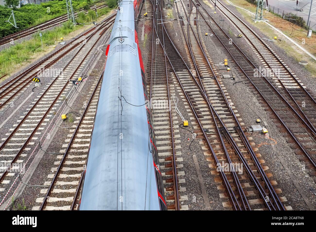 Multiple railroad tracks with junctions at a railway station in a ...