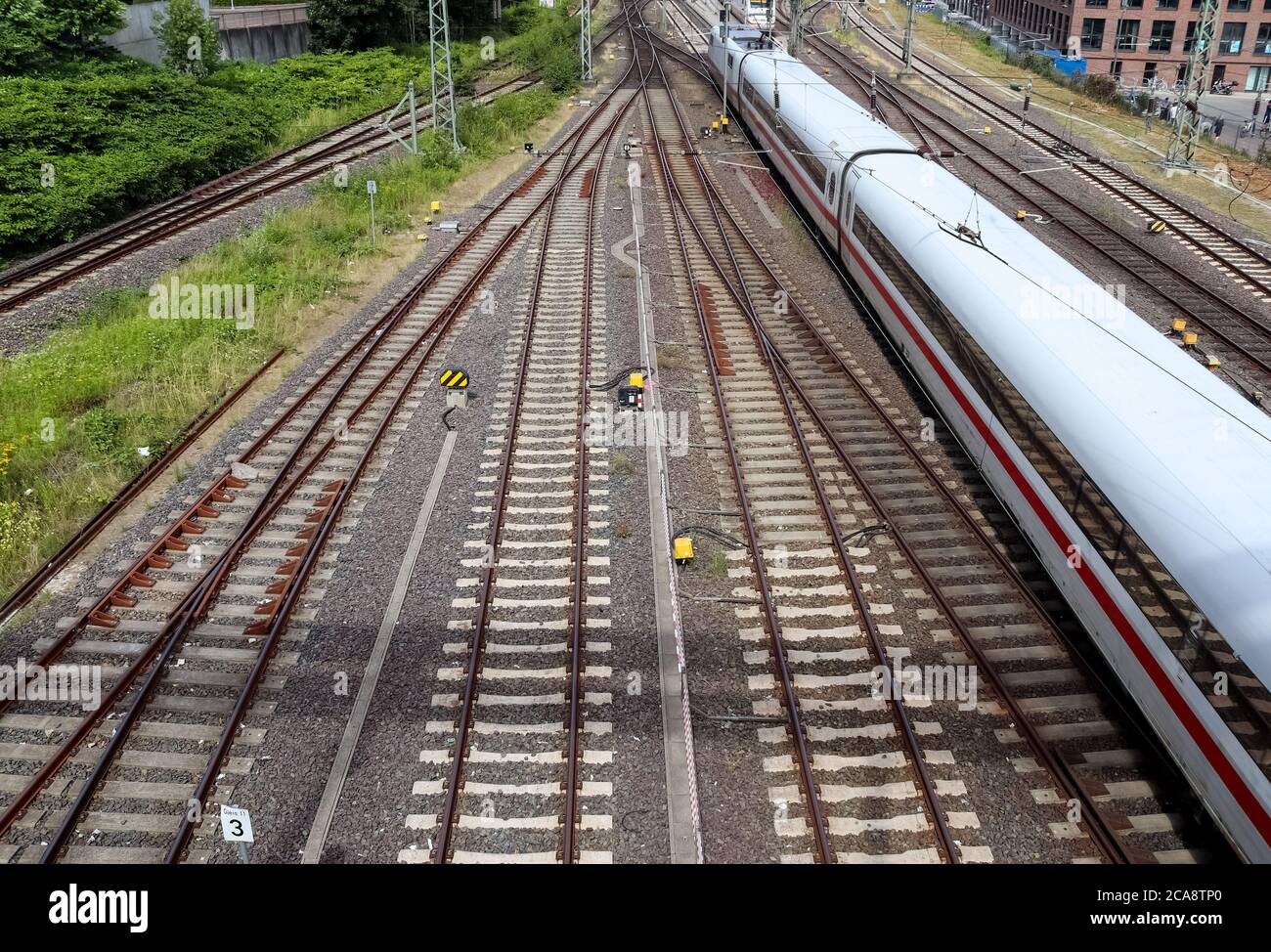 Multiple railroad tracks with junctions at a railway station in a ...