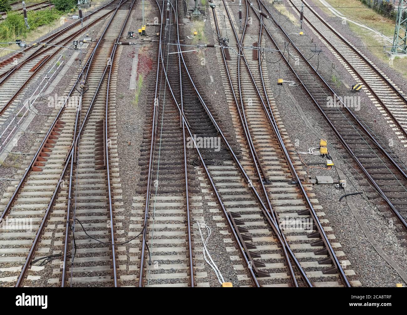 Multiple railroad tracks with junctions at a railway station in a ...