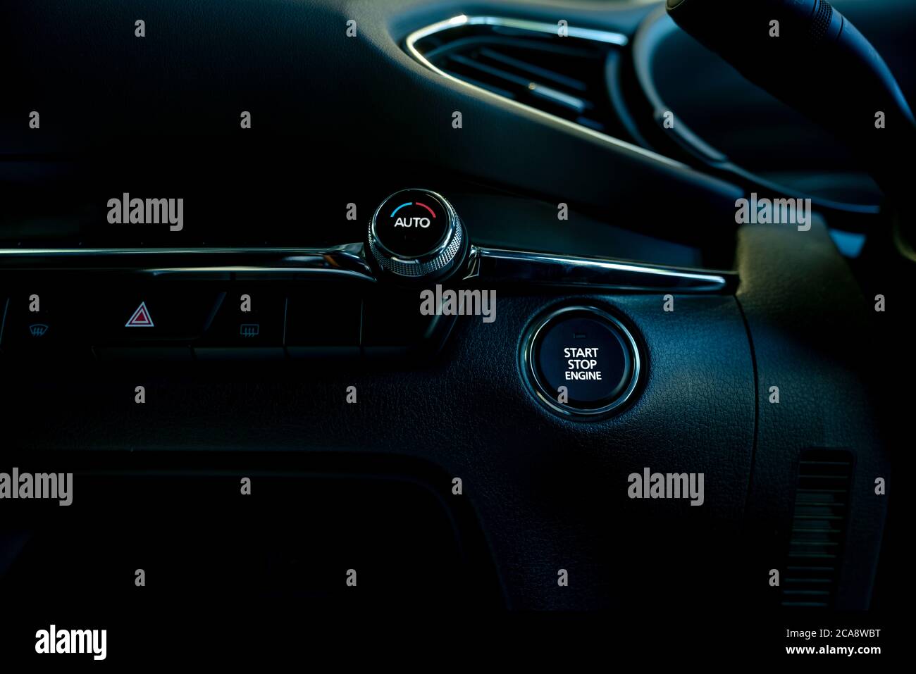 Start stop engine button of luxury car. Push up button for start or ...