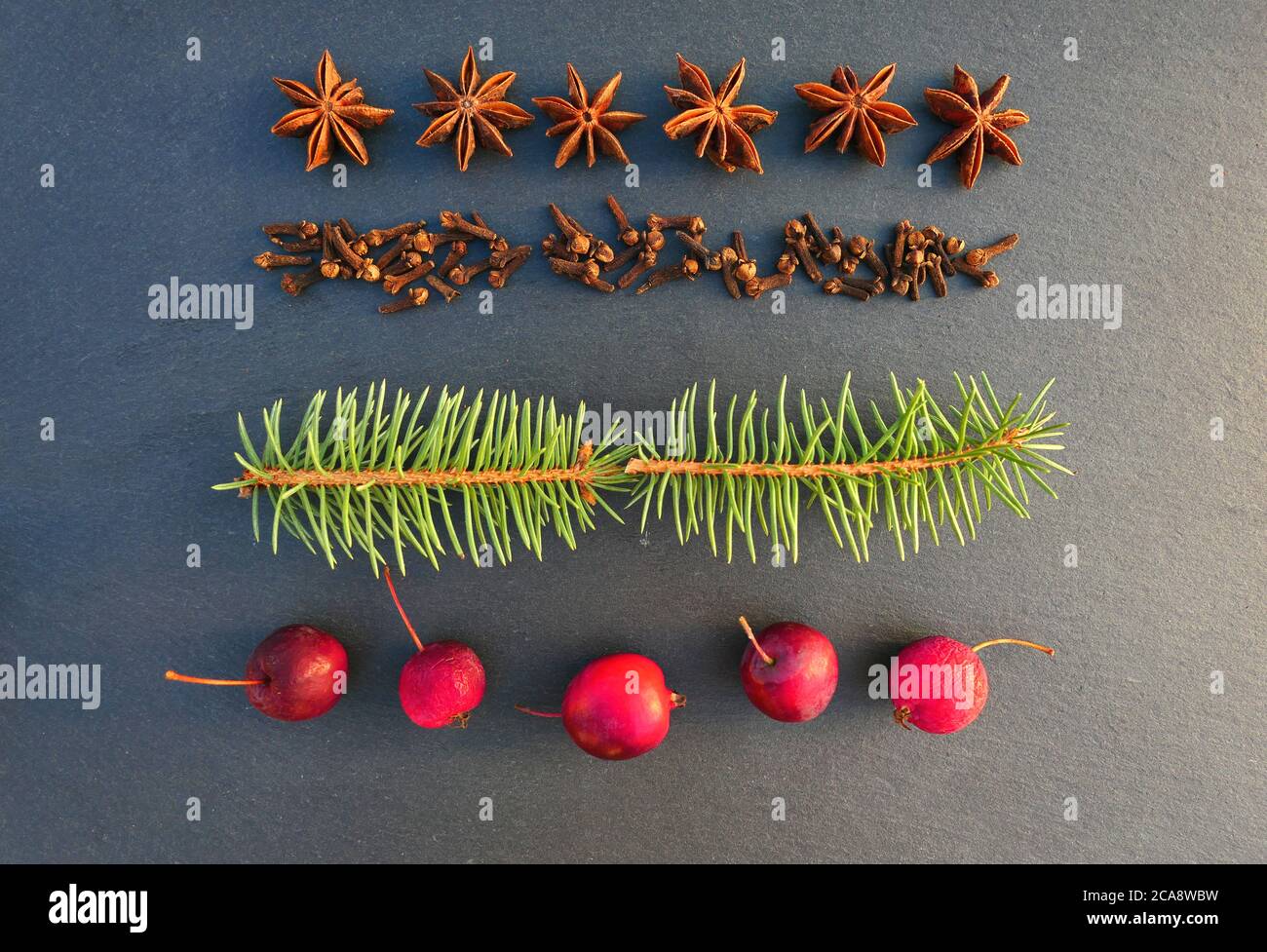 Christmas natural aromatic decoration. Spices, spruce tree branches and ...