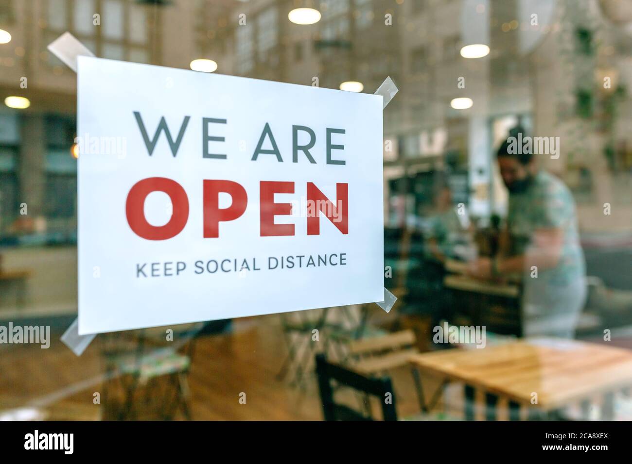 Commercial reopening poster after coronavirus Stock Photo - Alamy