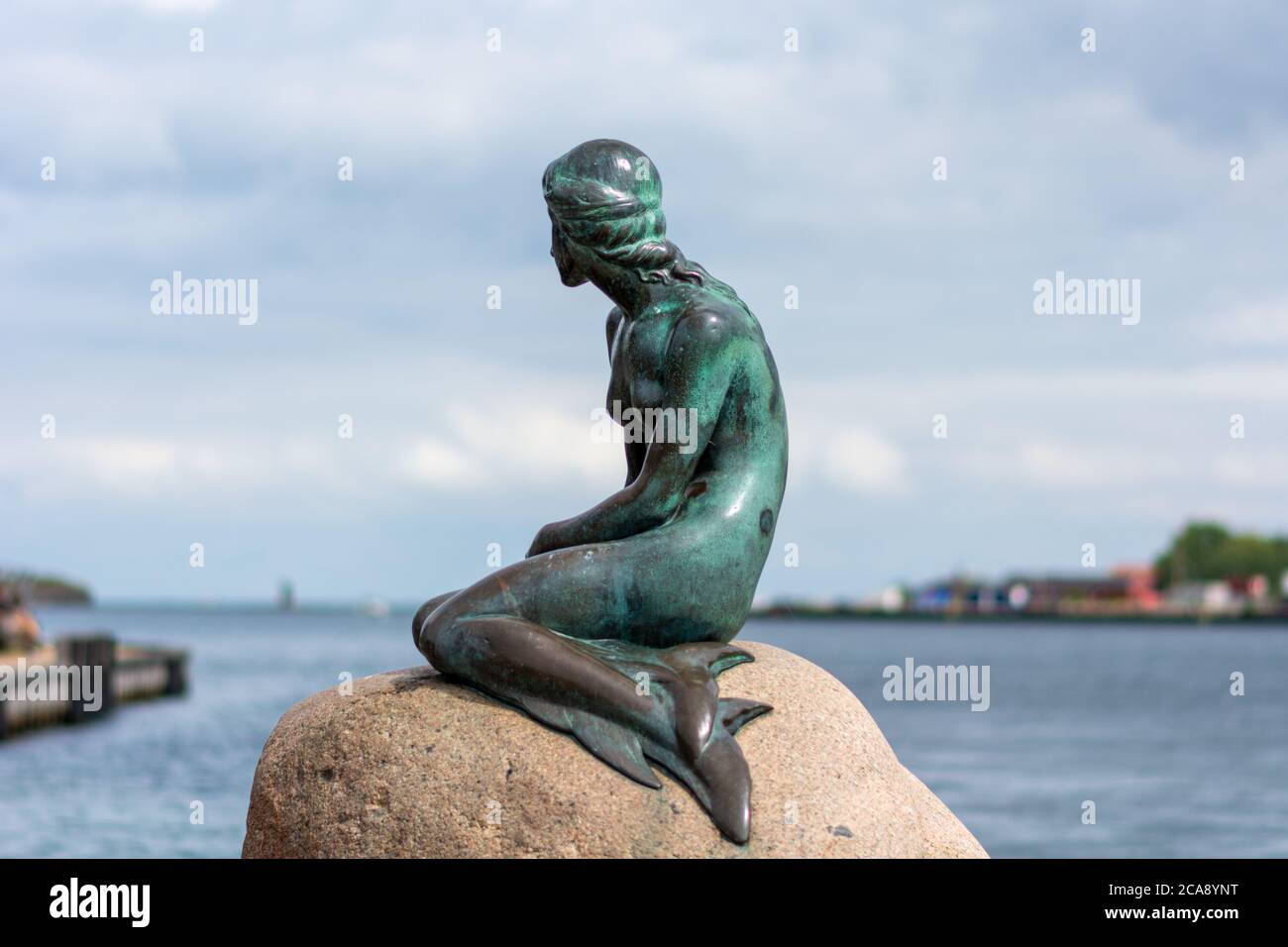 Copenhagen, Denmark - August 2, 2020: The famous little mermaid statue ...
