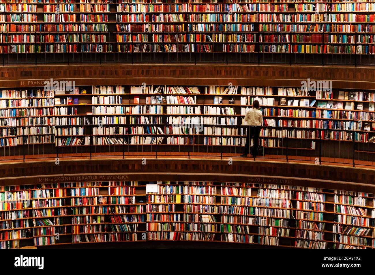 Man in a library in Stockholm Stock Photo - Alamy