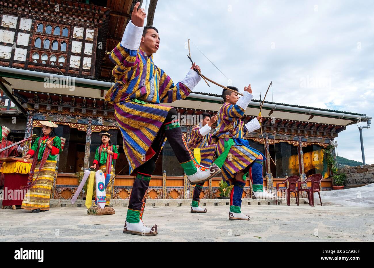 Bhutanese people performing the masked Cham Dance, Paro, Bhutan, Asia ...