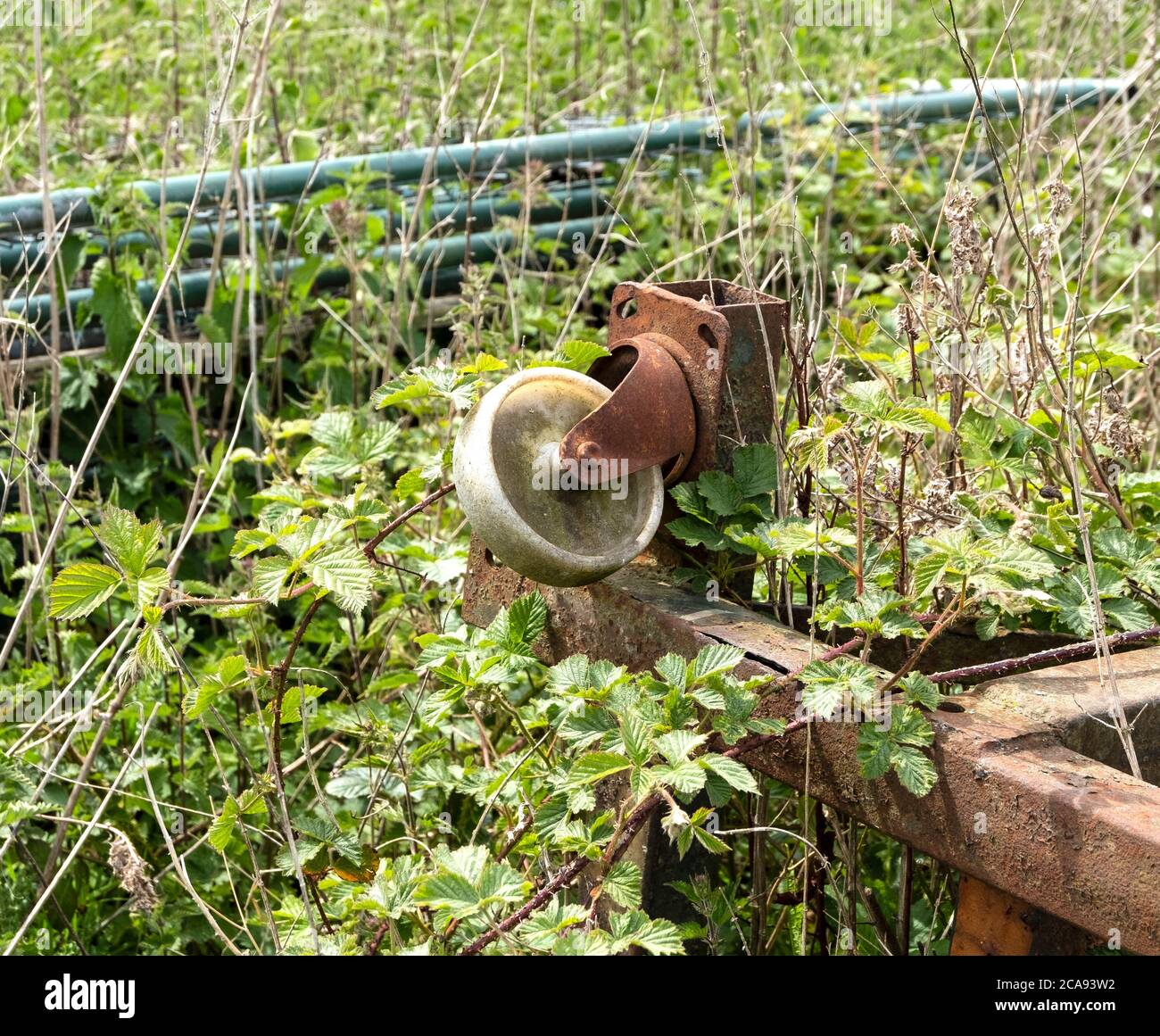Old rusty trolley wheel Stock Photo - Alamy